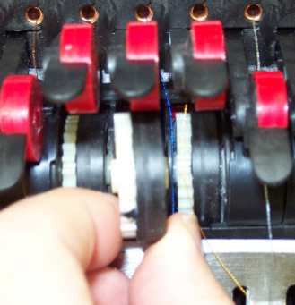 Clearing Thread from Thread Feeder Roller