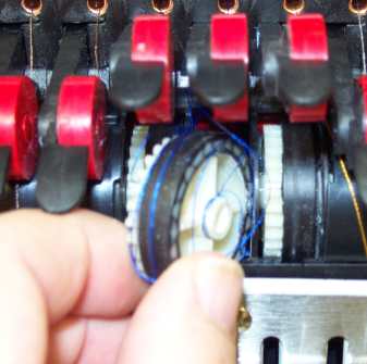 Clearing Thread from Thread Feeder Roller